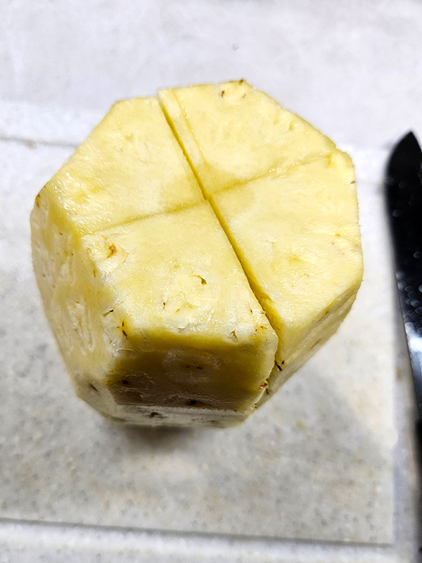 How To Easily Cut Up A Pineapple In 4 Simple Steps